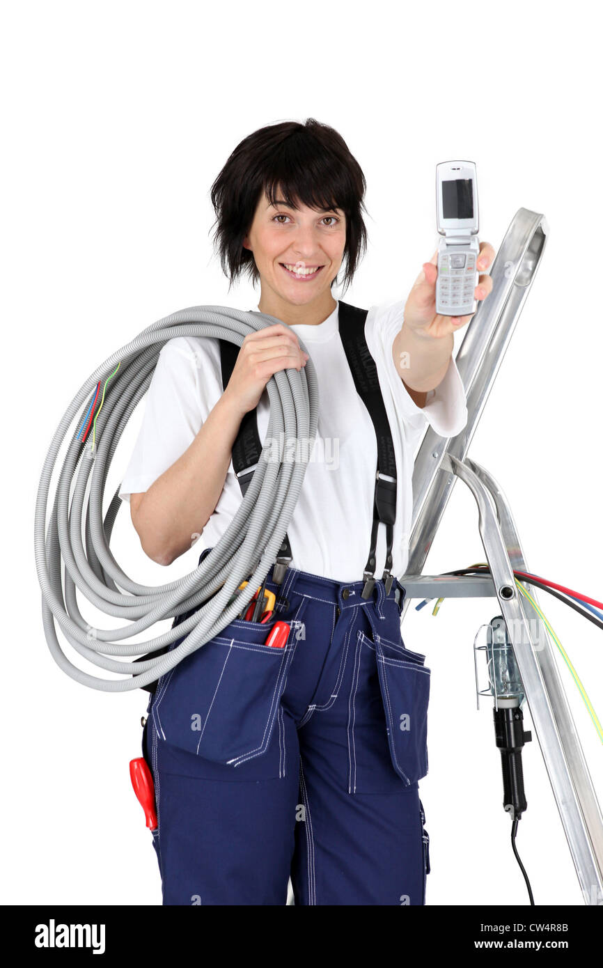 Female plumber isolated on white background Stock Photo - Alamy