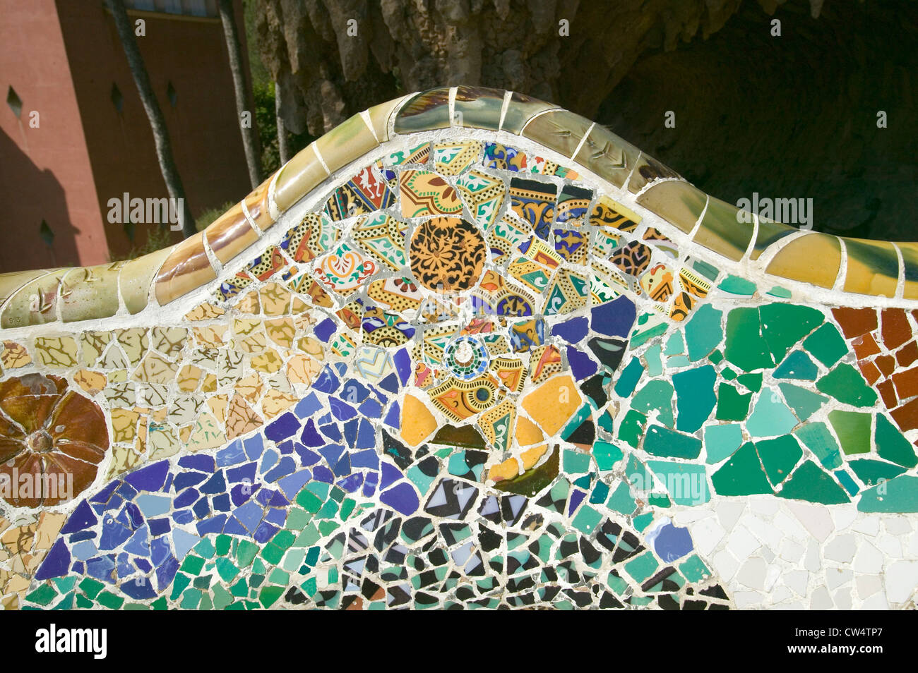 Closeup of mosaic of colored ceramic tile by Antoni Gaudi at his Parc ...