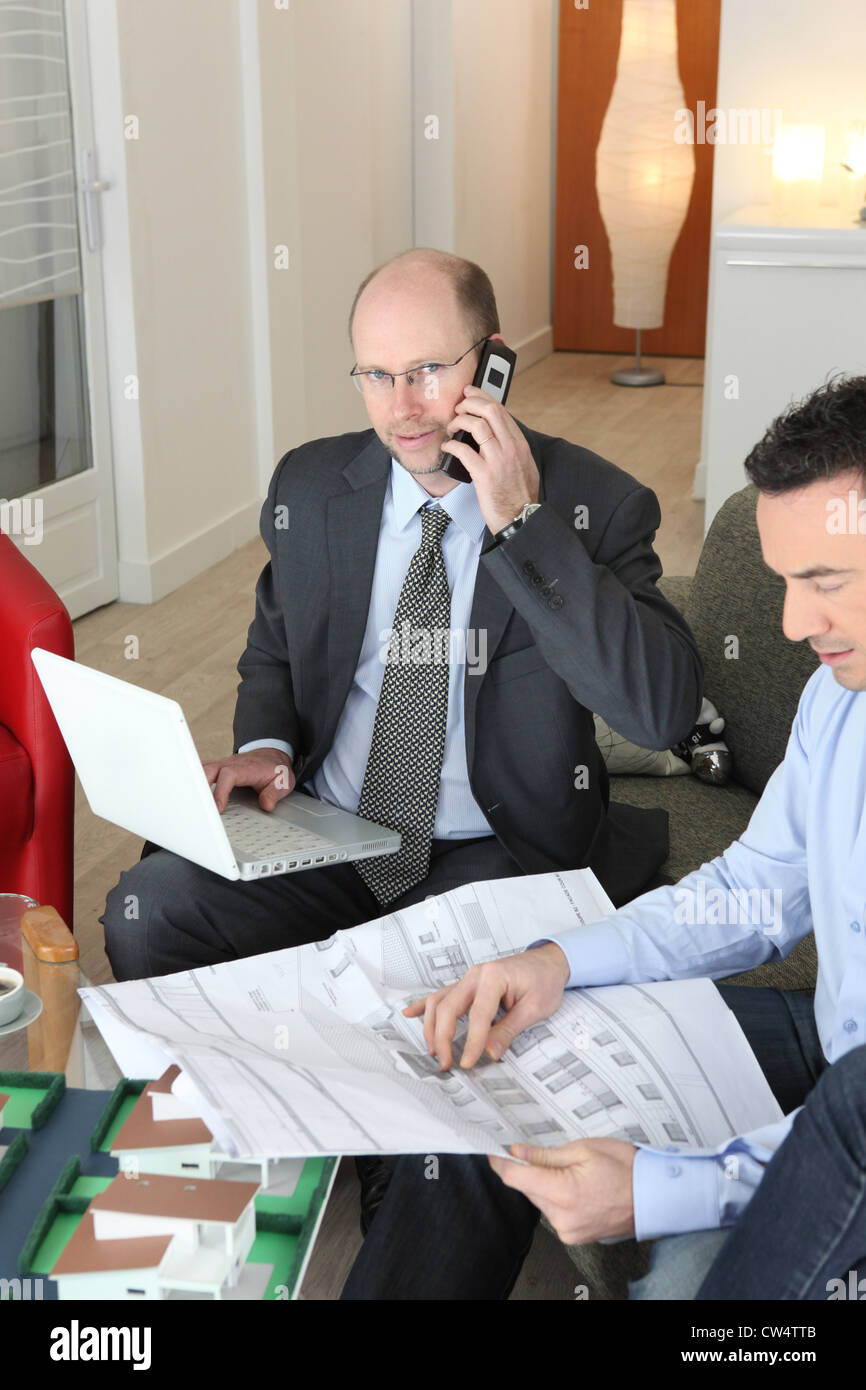 Architect and client Stock Photo - Alamy