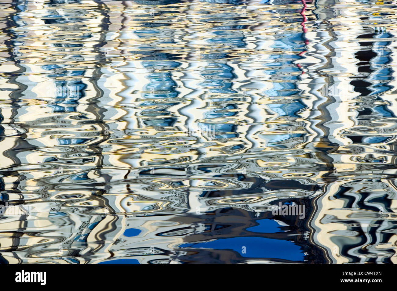 Morning water reflections of building at Port Vell, Old Harbor ...