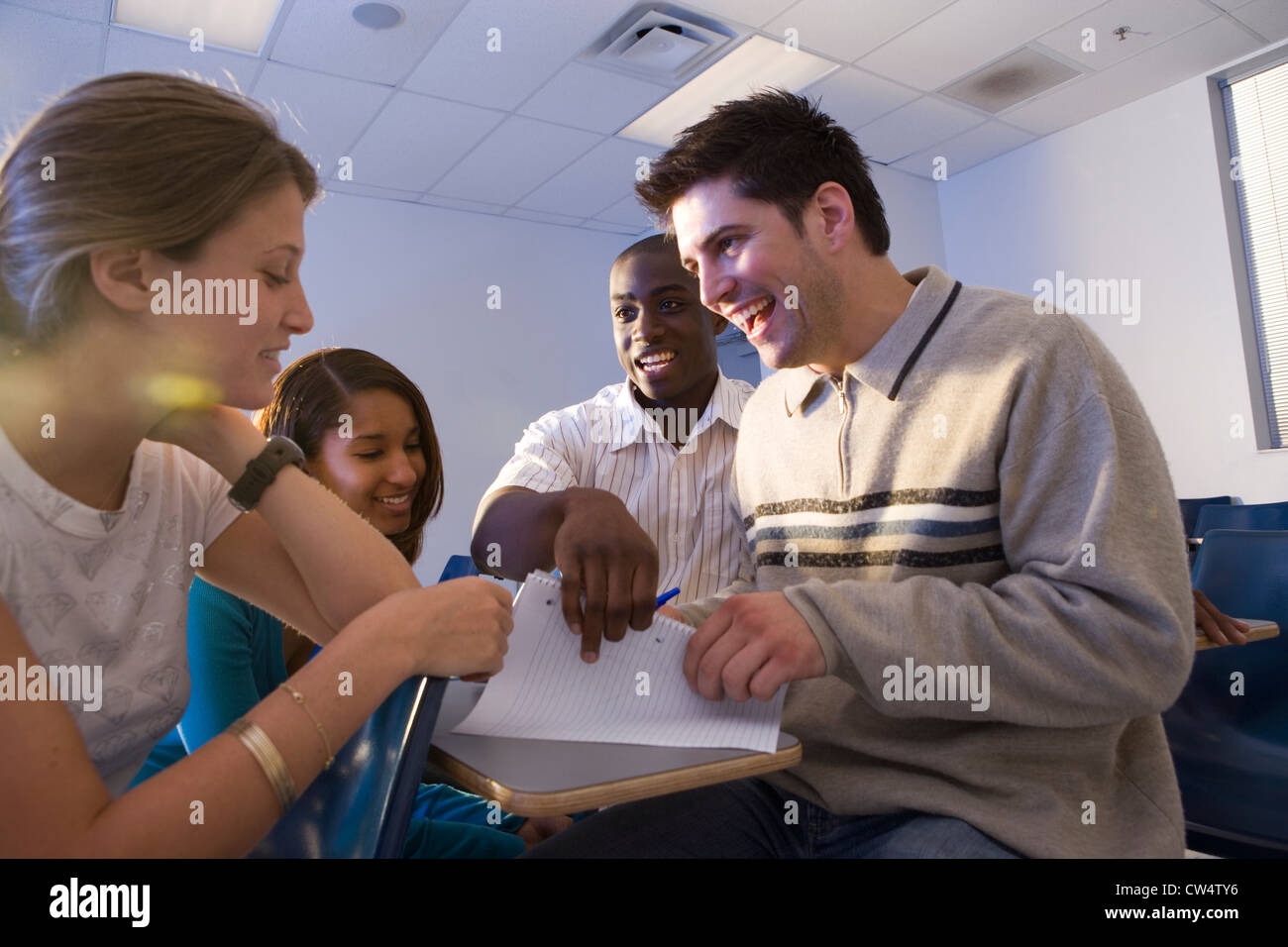 University students smiling in the classroom Stock Photo - Alamy
