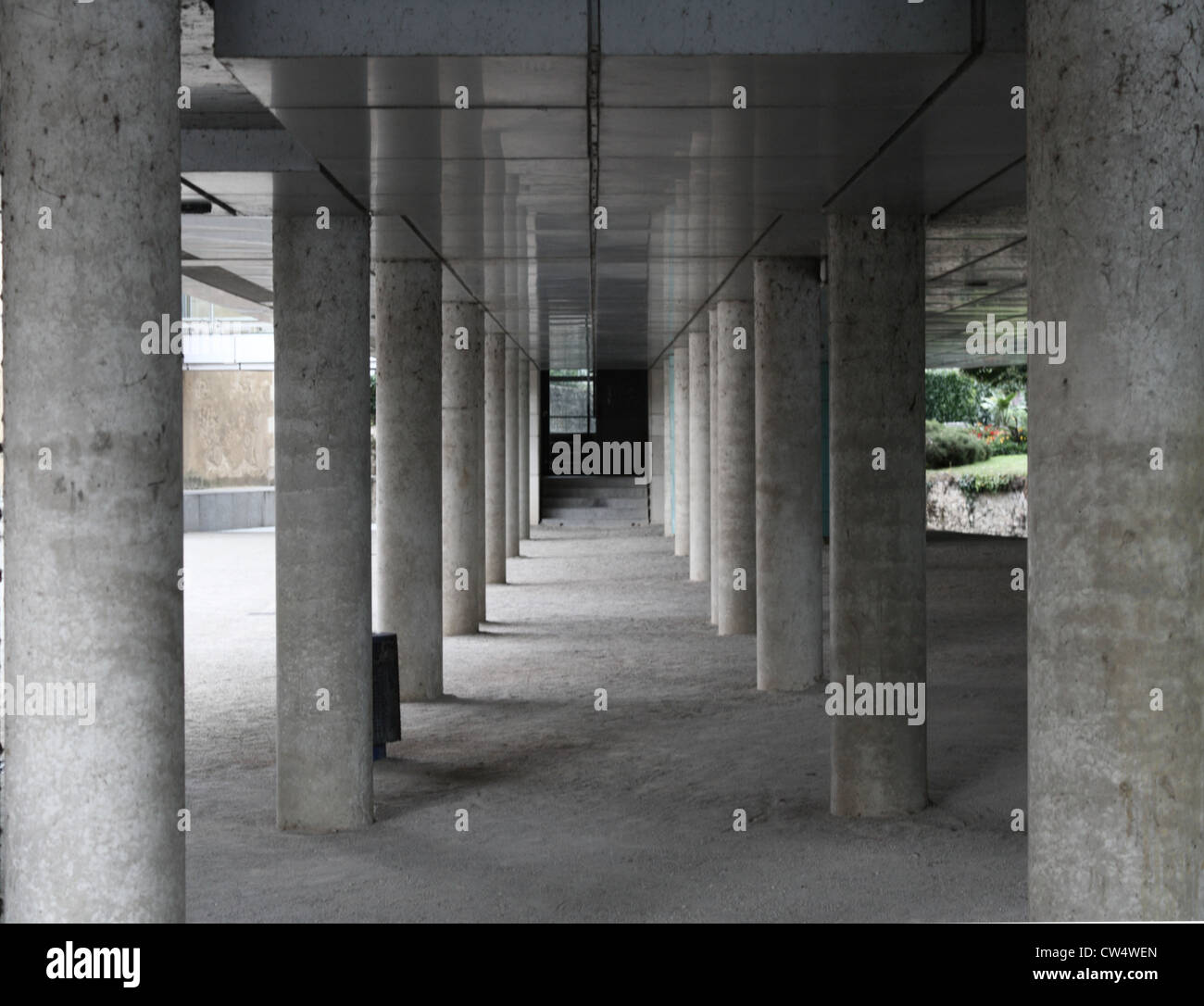 way between concrete columns Stock Photo - Alamy