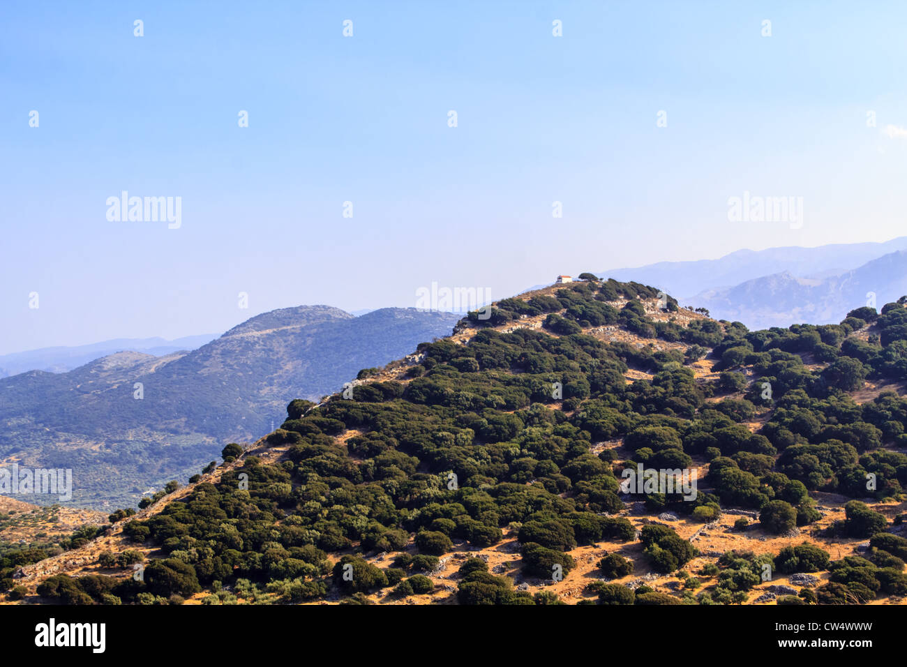 A small house on a hill in the middle of Crete Stock Photo - Alamy