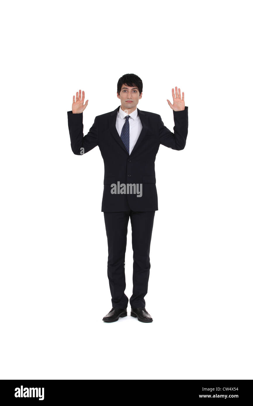 attractive businessman hands up Stock Photo - Alamy