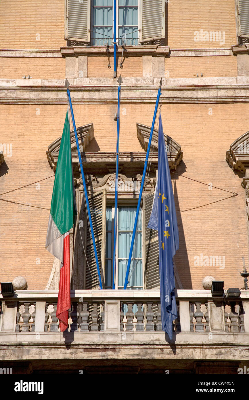 Italian and European Flag hanging from antique building in Rome, Italy ...