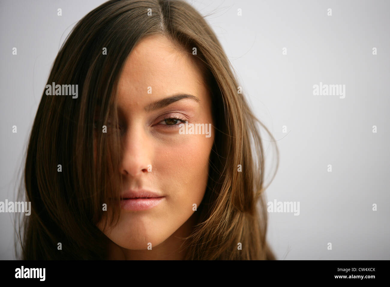 Stone faced brunette Stock Photo - Alamy