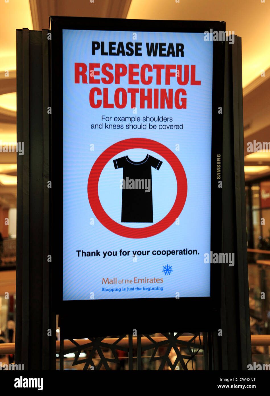 3658. Modesty sign, Mall of the Emirates, Dubai, UAE Stock Photo - Alamy