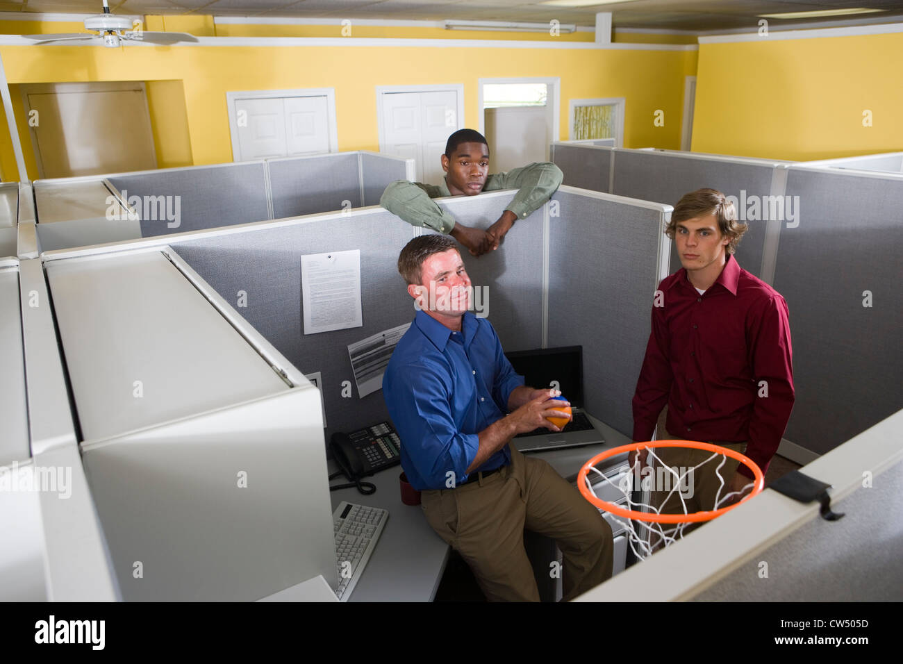 Businessmen looking to net in an office Stock Photo - Alamy