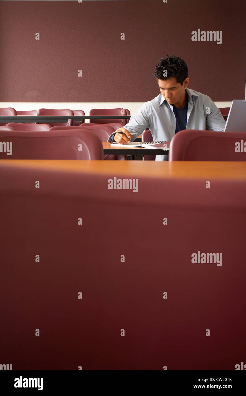 Student sitting lecture hall holding hi-res stock photography and ...