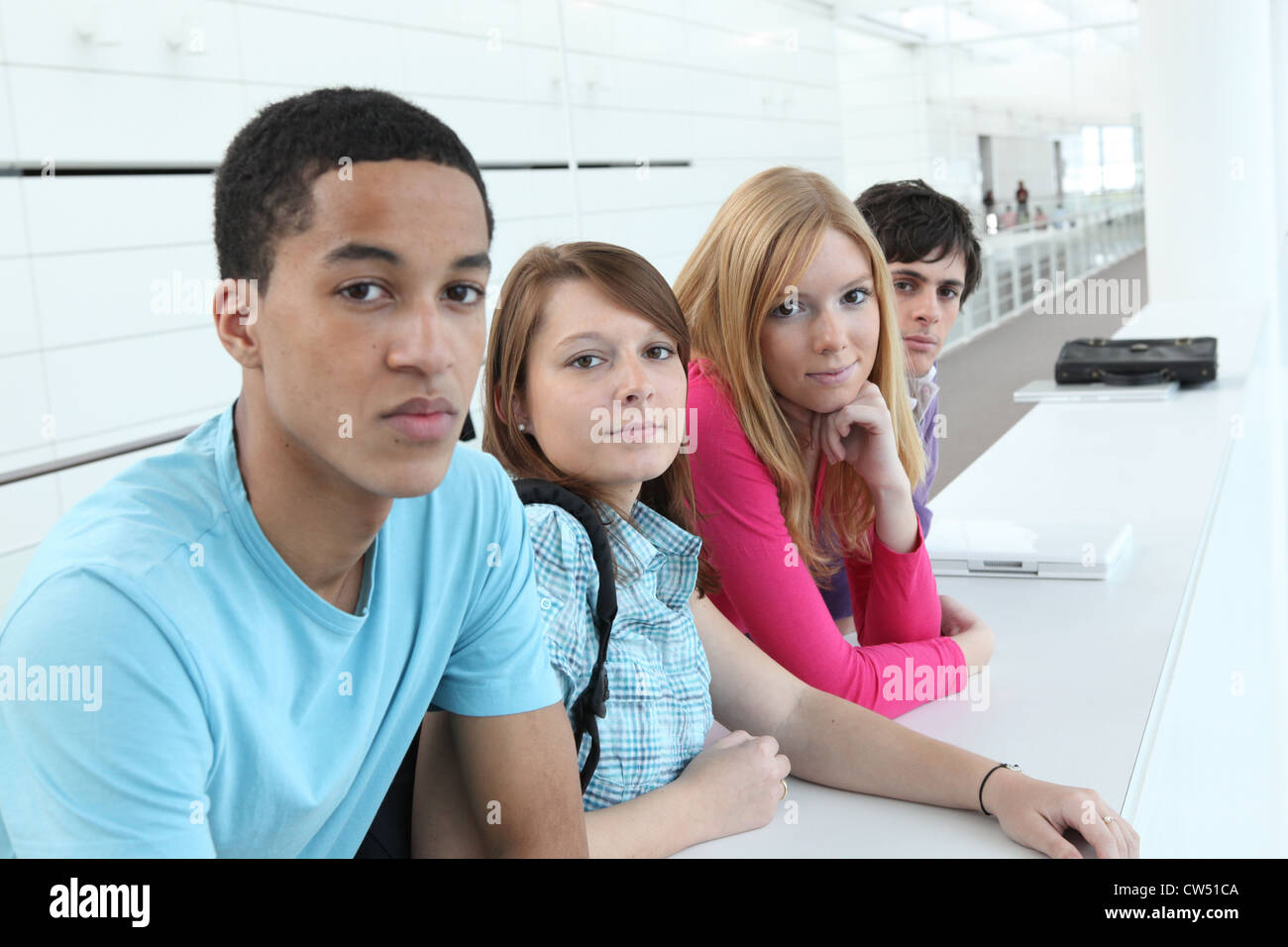 University student sat in a row Stock Photo - Alamy