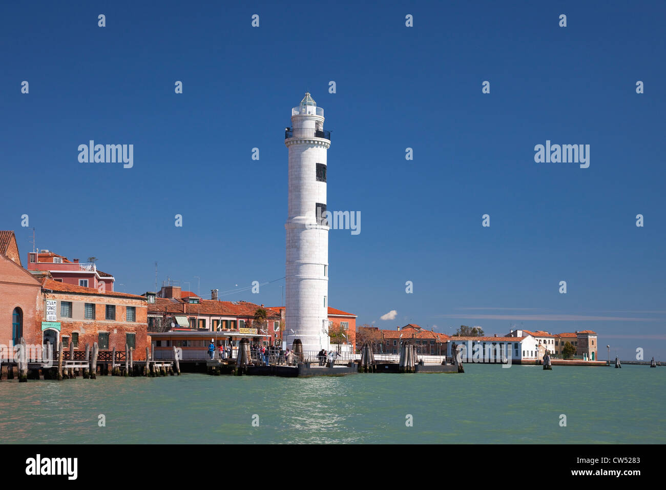 Lighthouse at the waterfront, Murano, Venice, Veneto, Italy Stock Photo ...