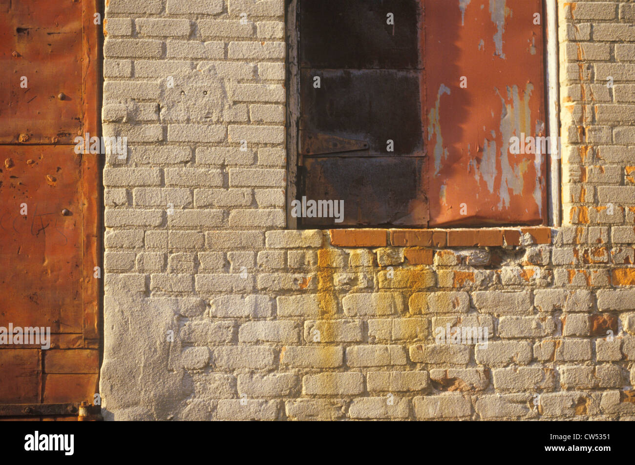 Close-up of historical brick building with rusty windows, Charleston ...