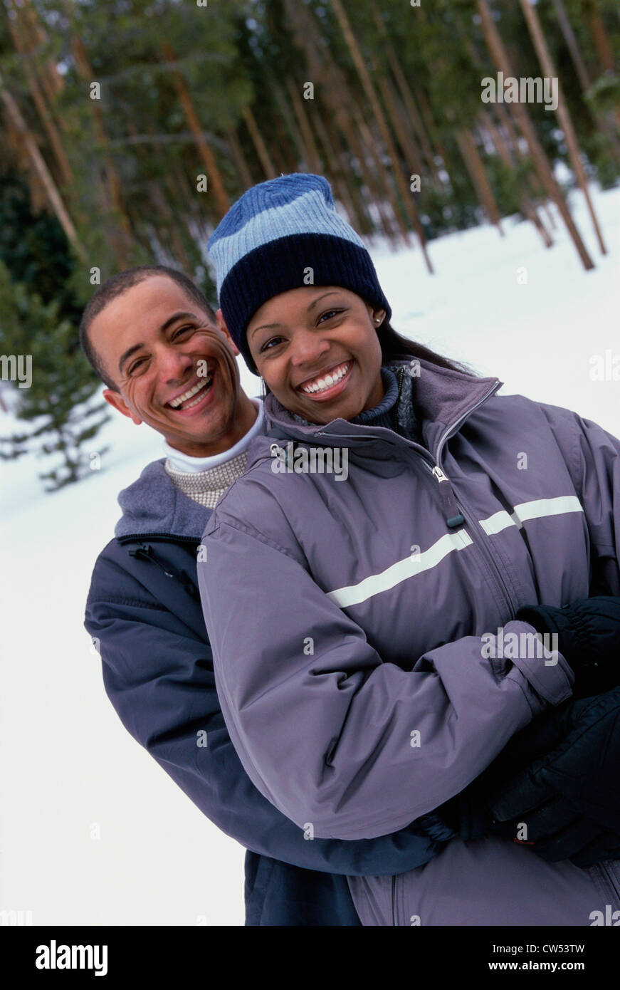 Man stand behind woman hi-res stock photography and images - Alamy