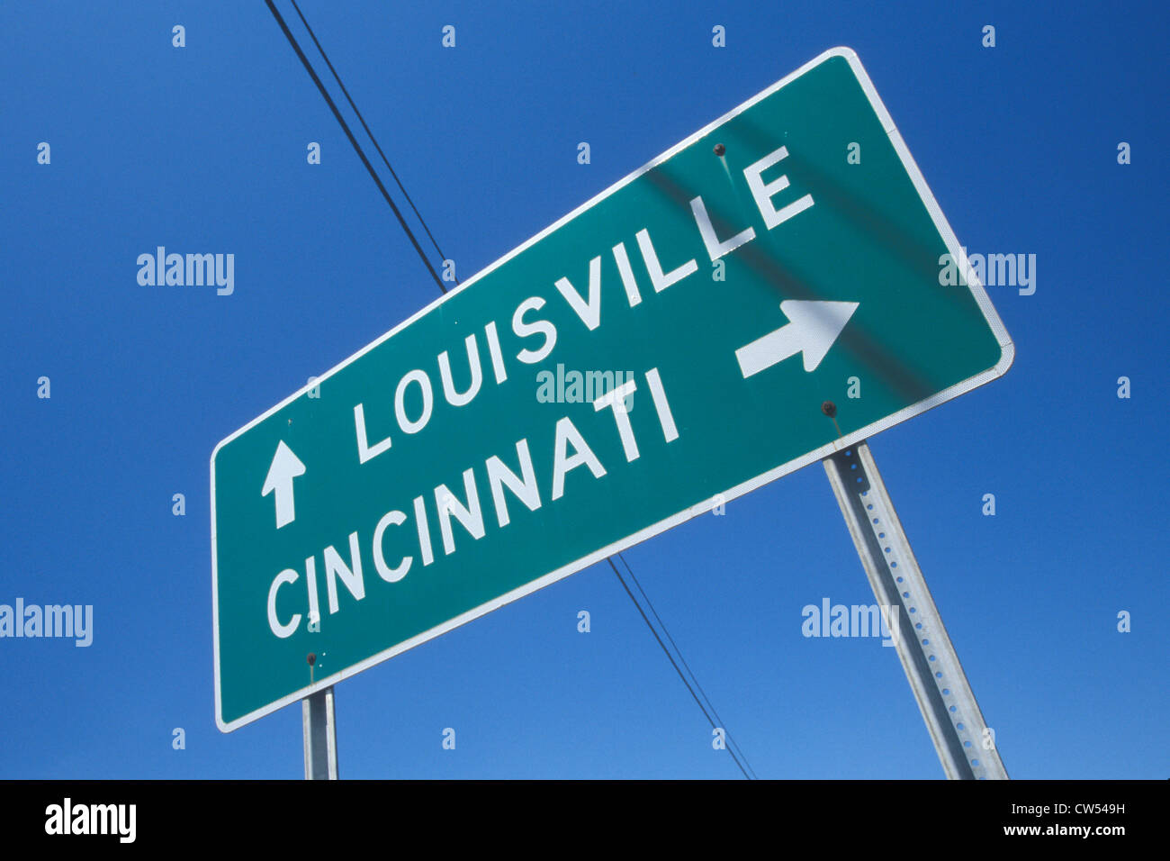 Freeway road sign to Louisville and Cincinnati Stock Photo - Alamy