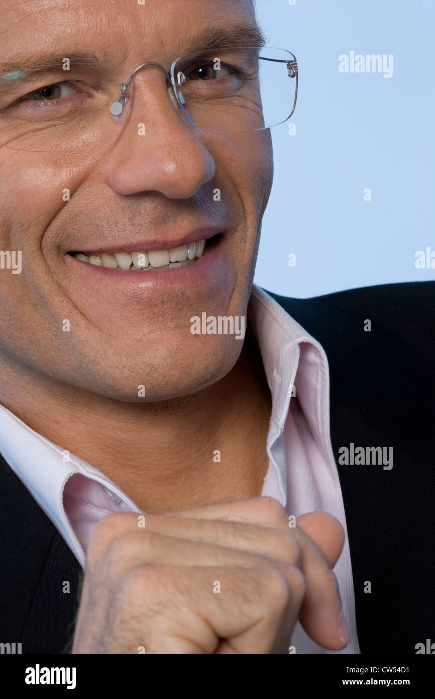 Portrait of a businessman smiling Stock Photo - Alamy