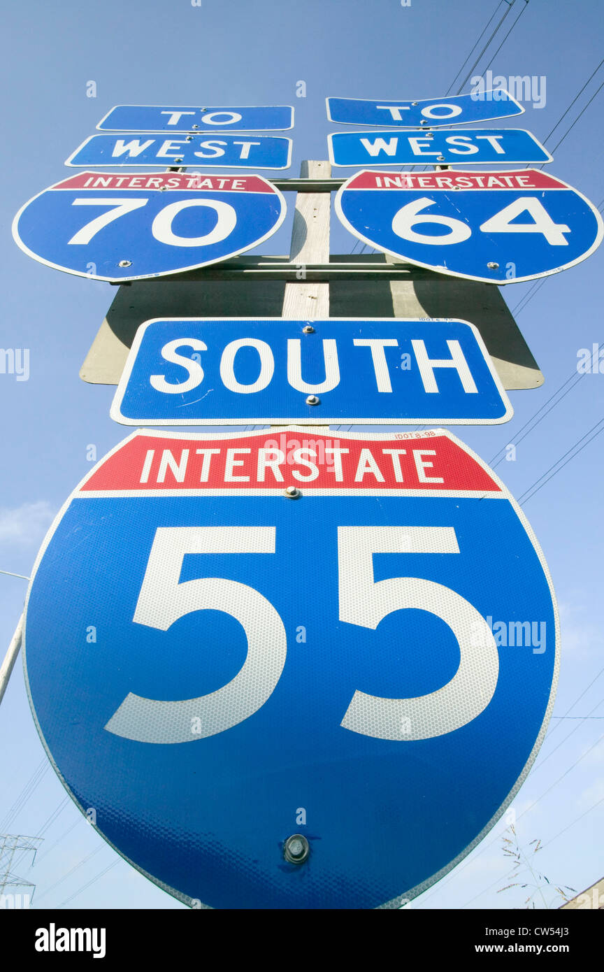 Interstate highway signs show the intersection of Interstate 70, 64 and ...