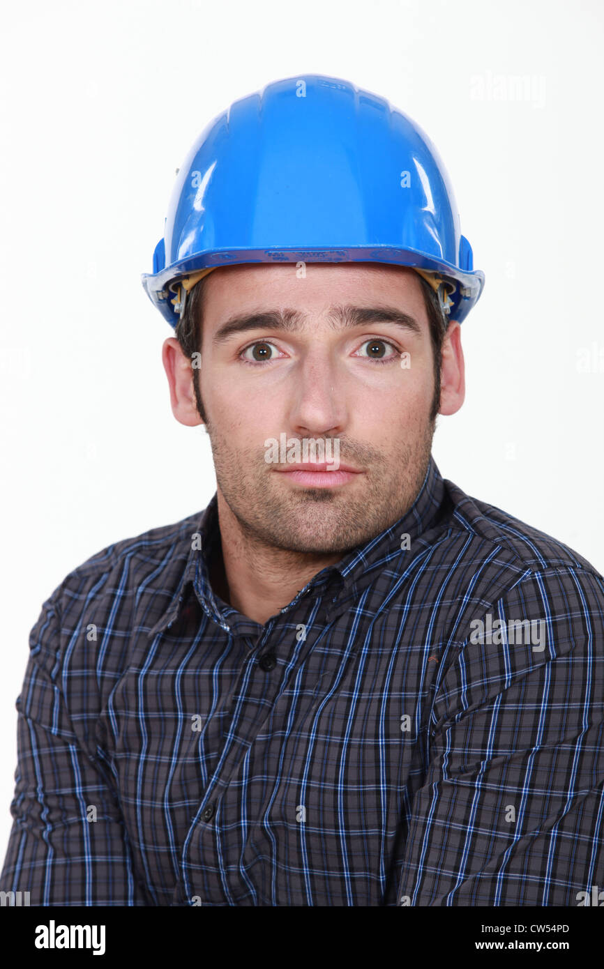 craftsman looking surprised Stock Photo - Alamy