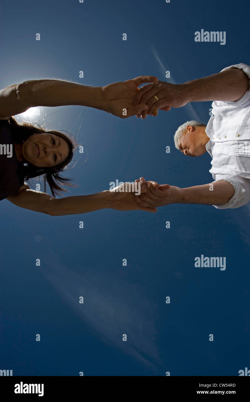 Below angle people hands holding hi-res stock photography and images ...