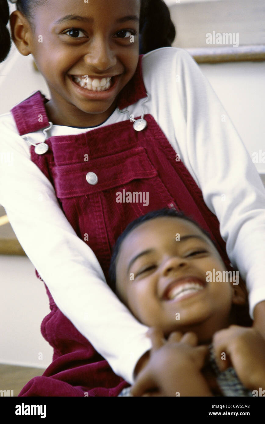Portrait of two girls playing together Stock Photo - Alamy