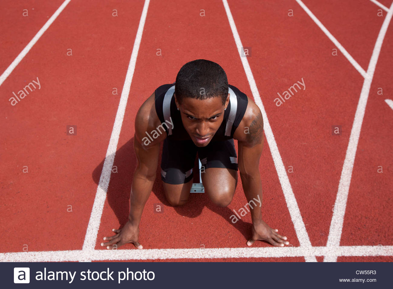 Male Sprinter In Blocks High Resolution Stock Photography and Images ...