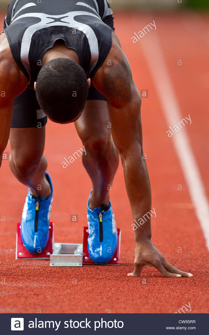 Male Sprinter In Blocks High Resolution Stock Photography and Images ...
