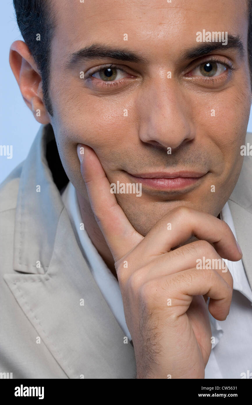 Smirking businessman hi-res stock photography and images - Alamy