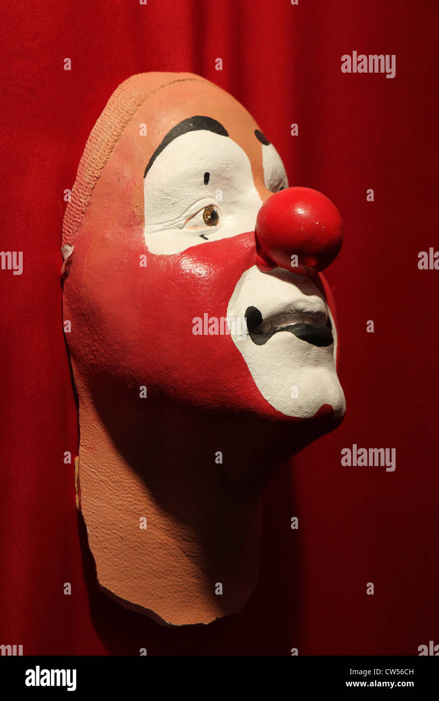 A plaster mask of a clown face Stock Photo - Alamy