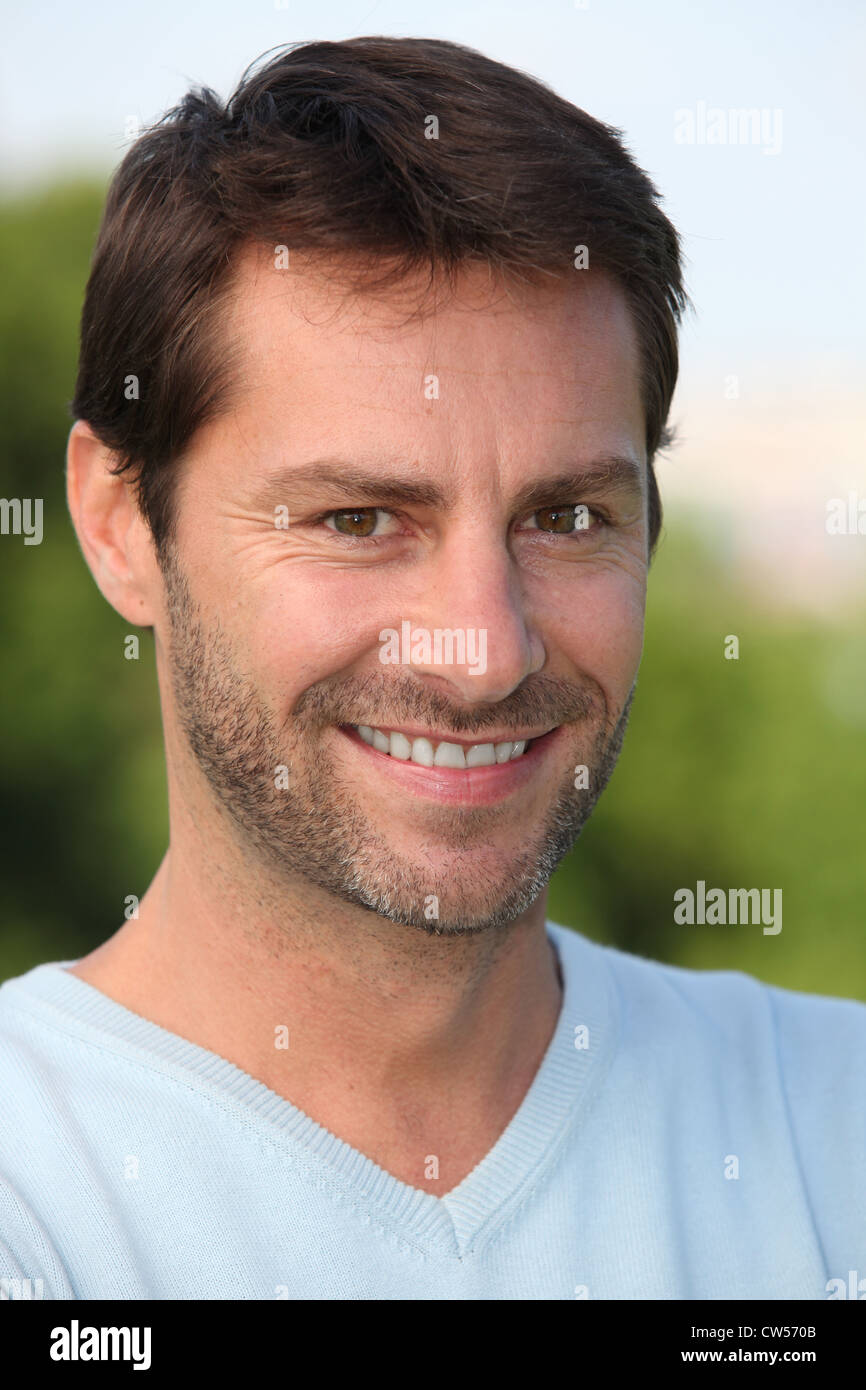 Portrait of smiling man Stock Photo - Alamy