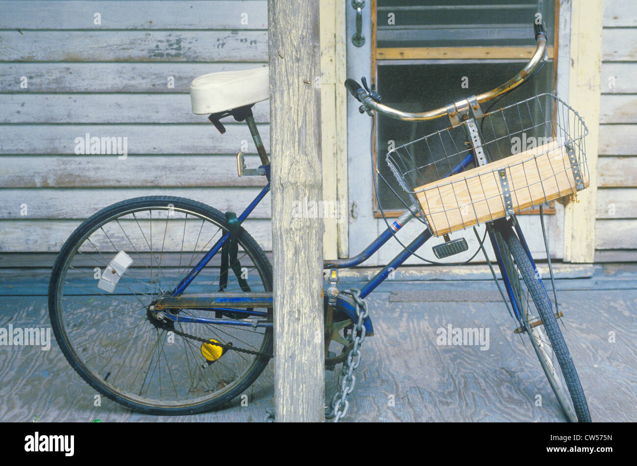 Bicycle parked on front porch, Key West, FL Stock Photo - Alamy