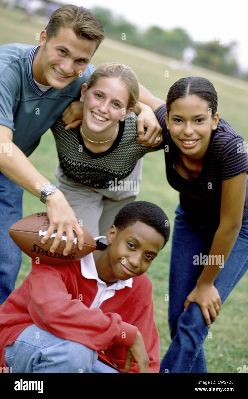 Portrait of a group of teenagers smiling Stock Photo - Alamy