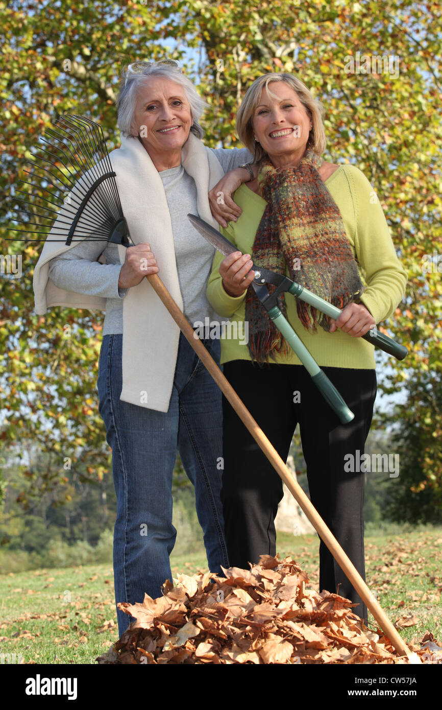 Two old ladies in the garden Stock Photo - Alamy