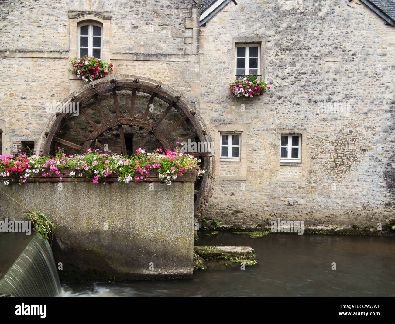 A water wheel on the Aure River in Bayeux, Normandy, France Stock Photo ...