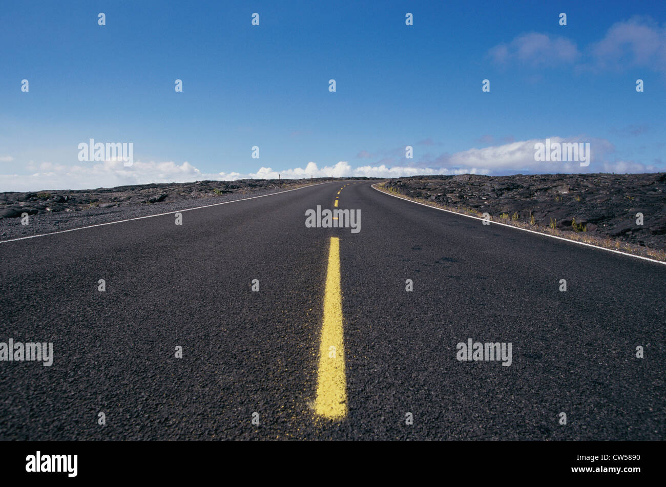 Road passing through a landscape, Hawaii Volcanoes National Park ...