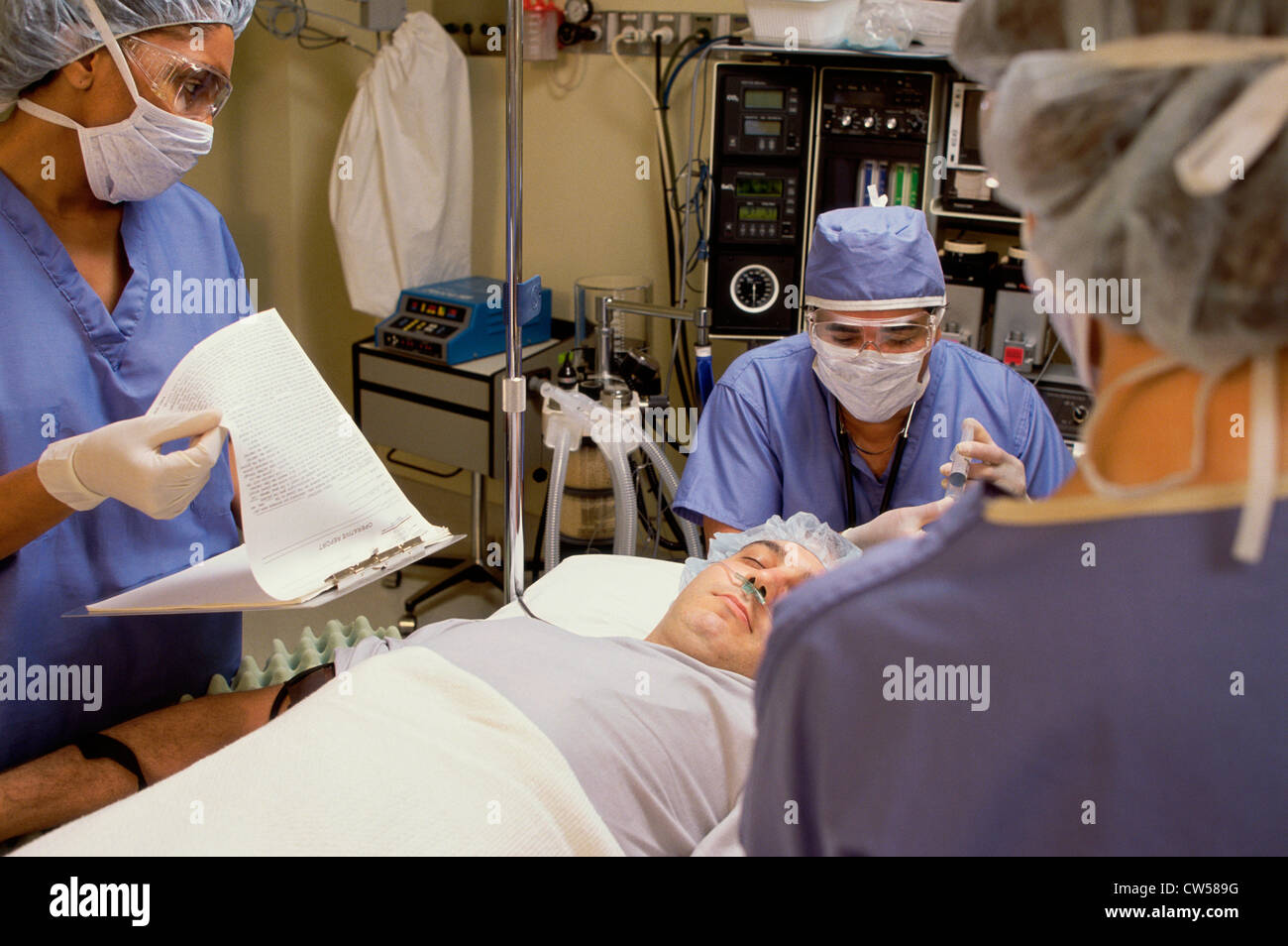 Woman lying on operating table hi-res stock photography and images - Alamy