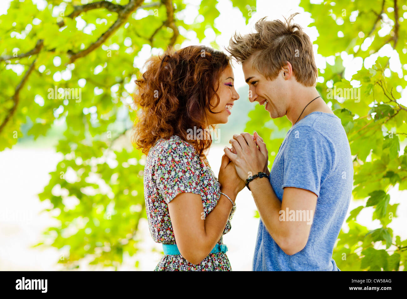 Romatic couple embracing outside Stock Photo - Alamy