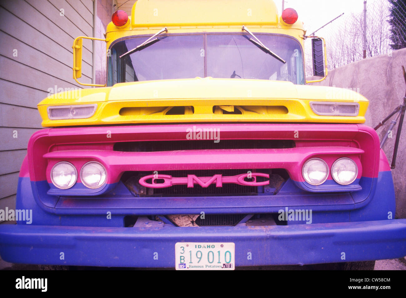 A blue purple yellow bus in Oregon Stock Photo - Alamy