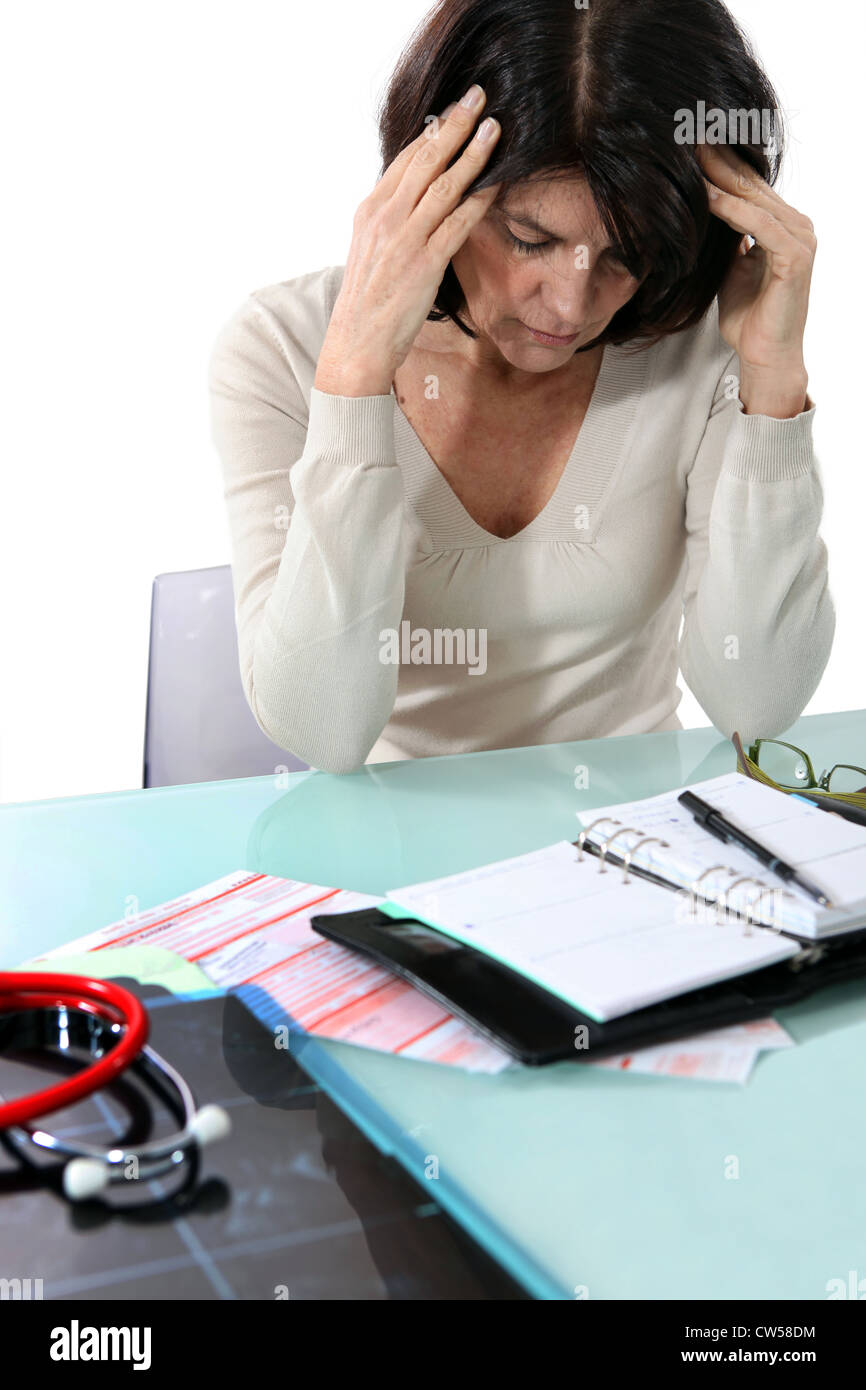 Female doctor with problems Stock Photo - Alamy