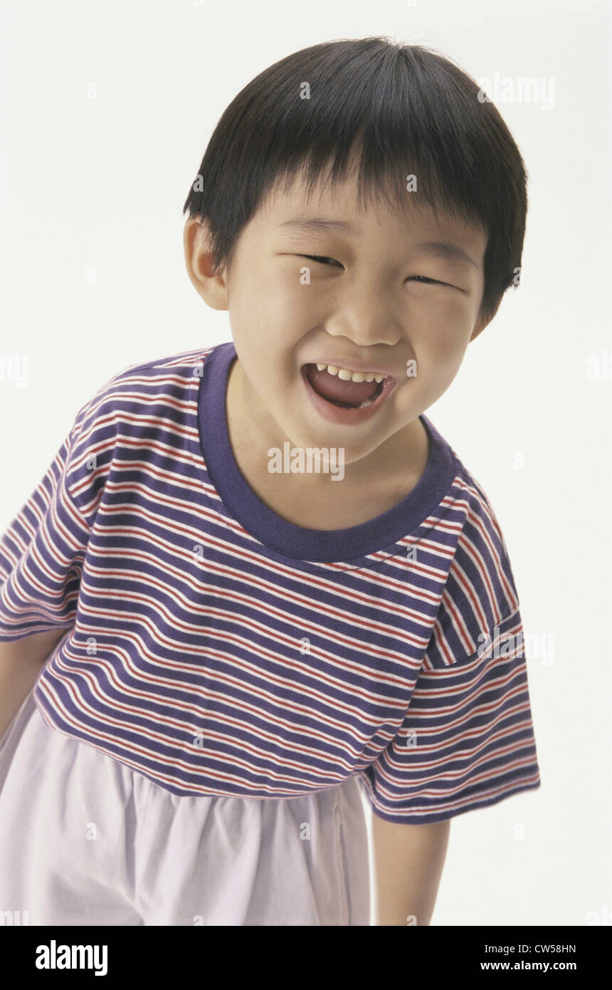 Portrait of a boy laughing Stock Photo - Alamy