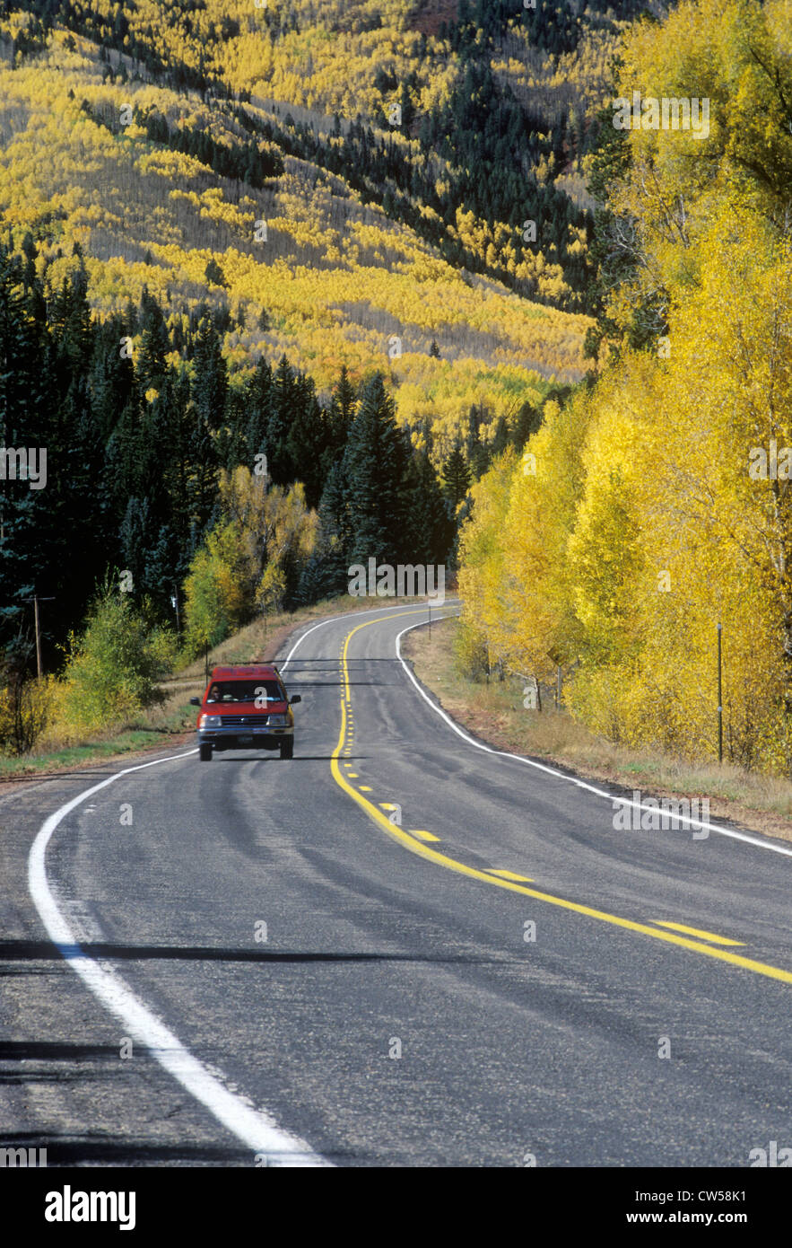 A truck traveling in autumn on Route 145 in Colorado Stock Photo - Alamy