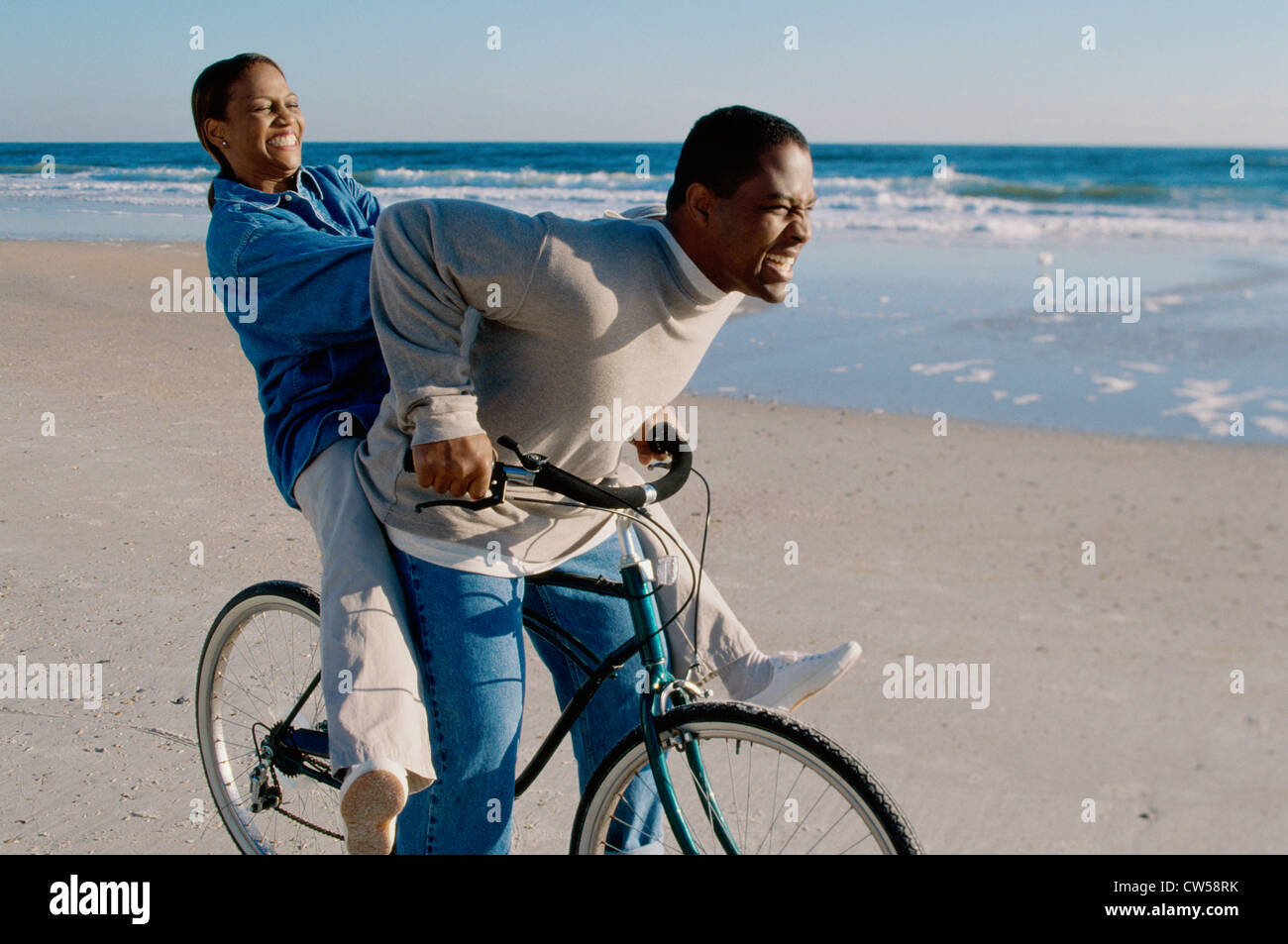Two men fighting over woman hi-res stock photography and images - Alamy
