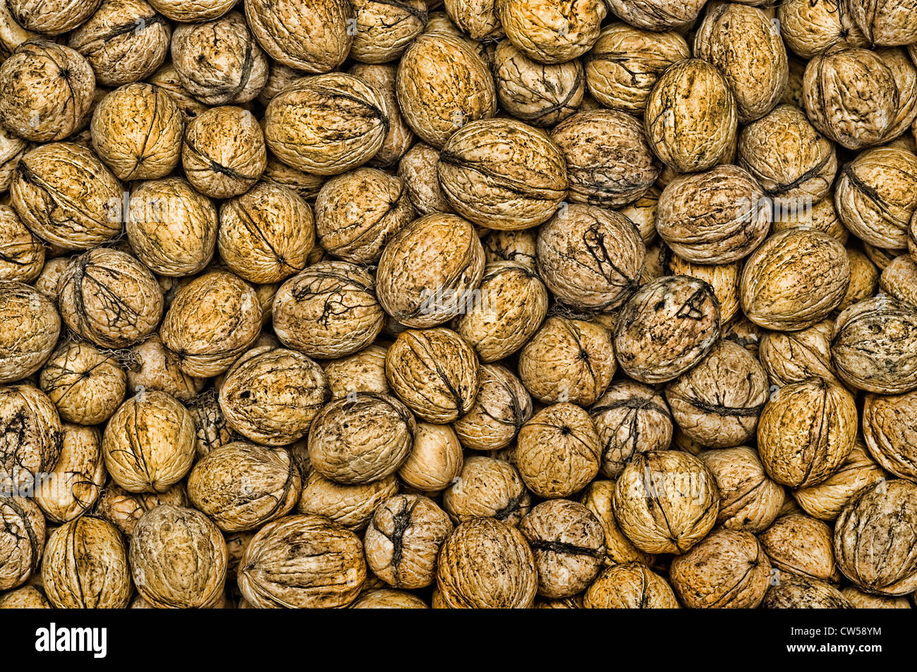 grunge scattered walnut background Stock Photo - Alamy