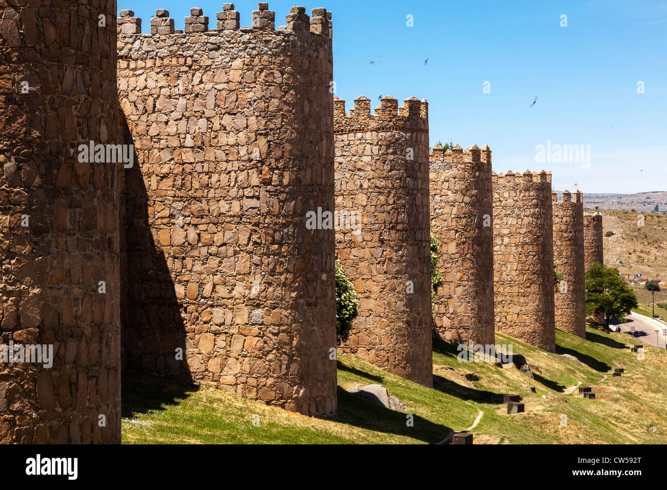 The fortification of the medieval city walls of Avila under a clear ...