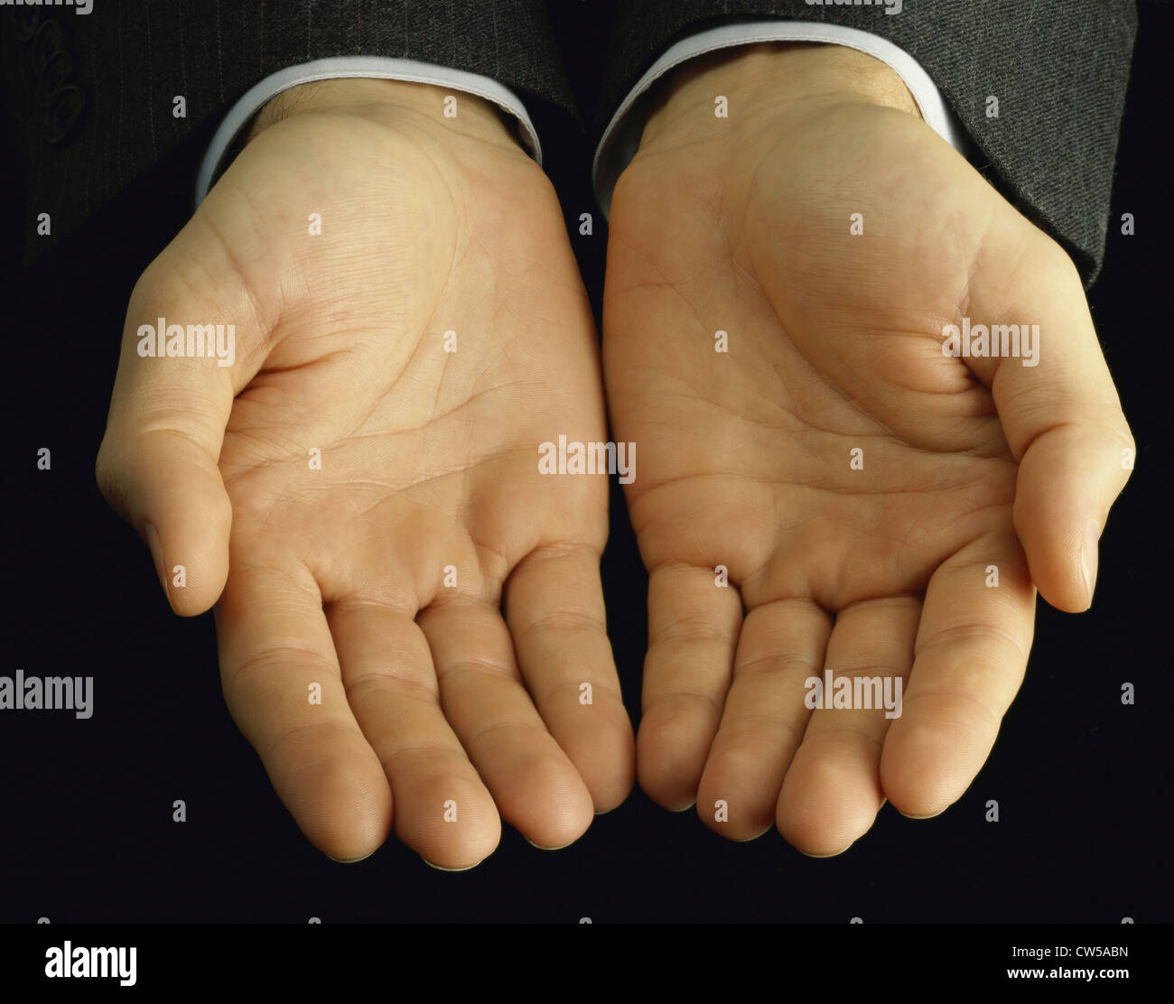 Close-up of a man's hands cupped Stock Photo - Alamy