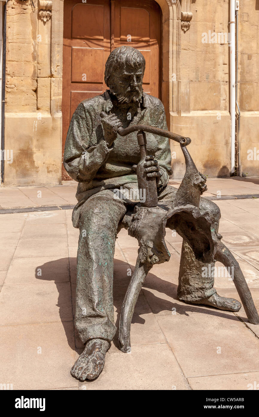 Bronzed statues depicting stages of the wine making process, in the ...