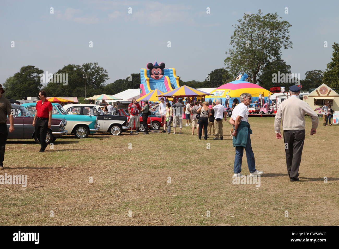 Fairground rides and classic cars at a country show Stock Photo - Alamy