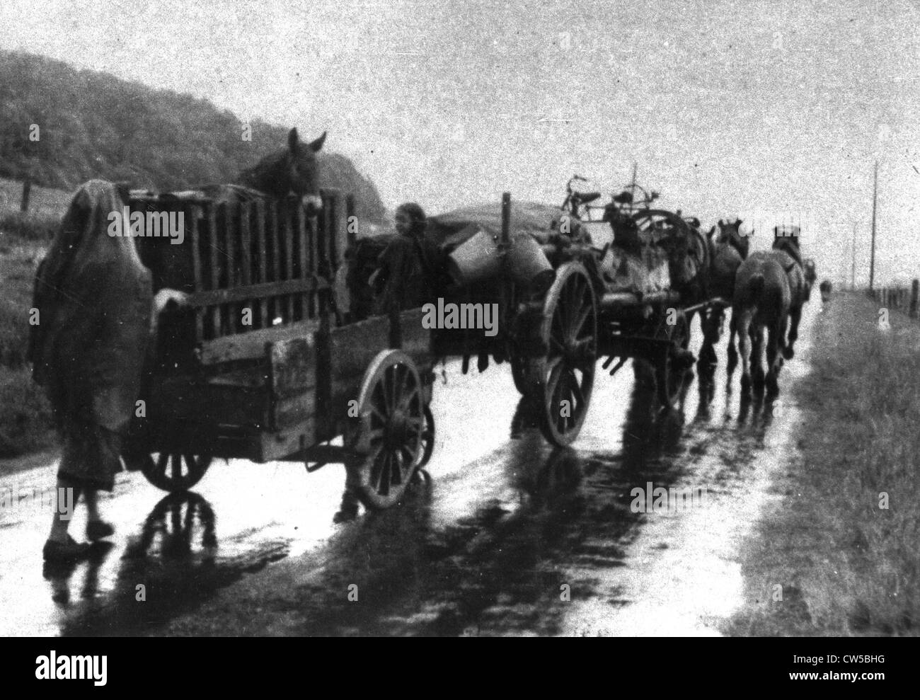 France, Exodus, in the rain, of refugees leaving their town and homes ...