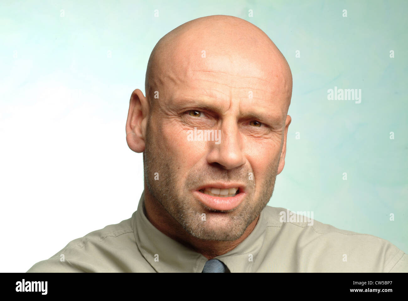 Man looks skeptical Stock Photo - Alamy