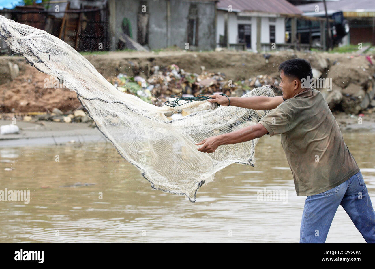 Fisherman casts net ocean hi-res stock photography and images - Alamy