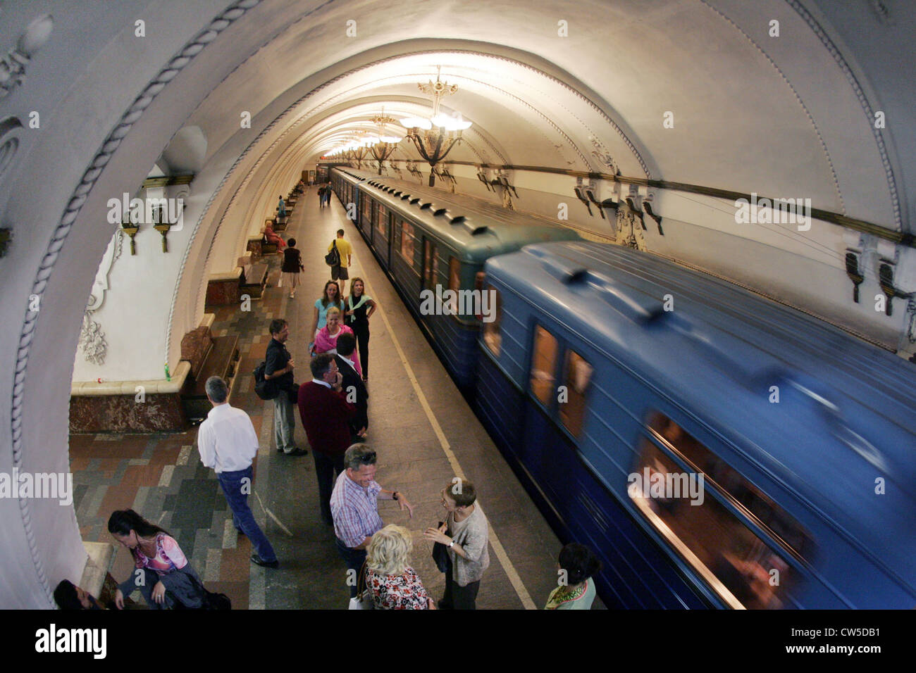 Moscow - waiting passengers in the metro station Arbatskaya Stock Photo ...