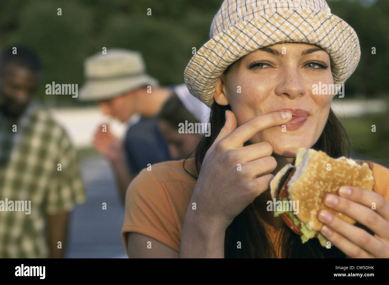 African eating a burger hi-res stock photography and images - Alamy